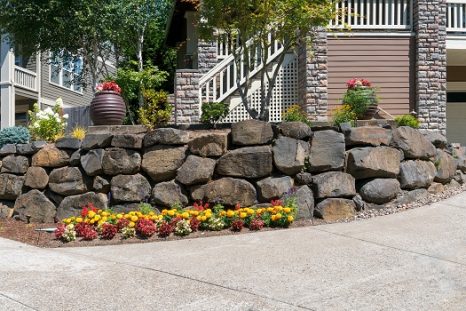 How Do You Put a Rock Border around Your House?